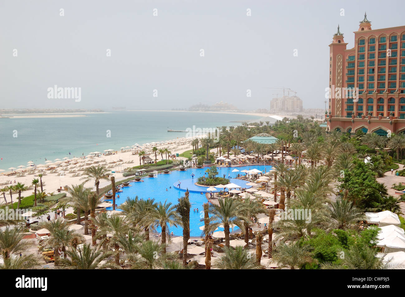 The beach and swimming pool at luxury hotel, Dubai, UAE Stock Photo - Alamy