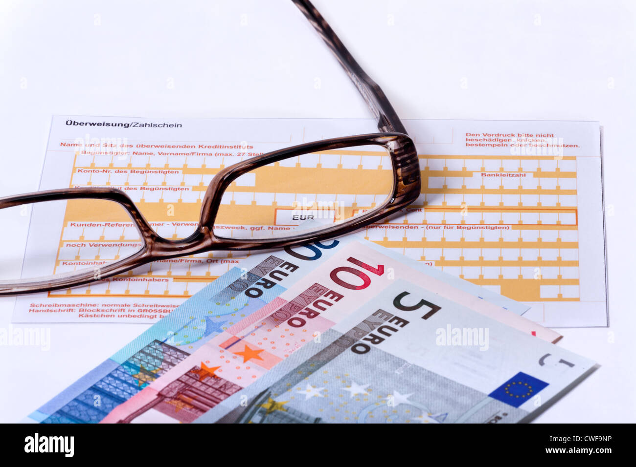 Blank Payment form with banknotes and a glasses on white background ...