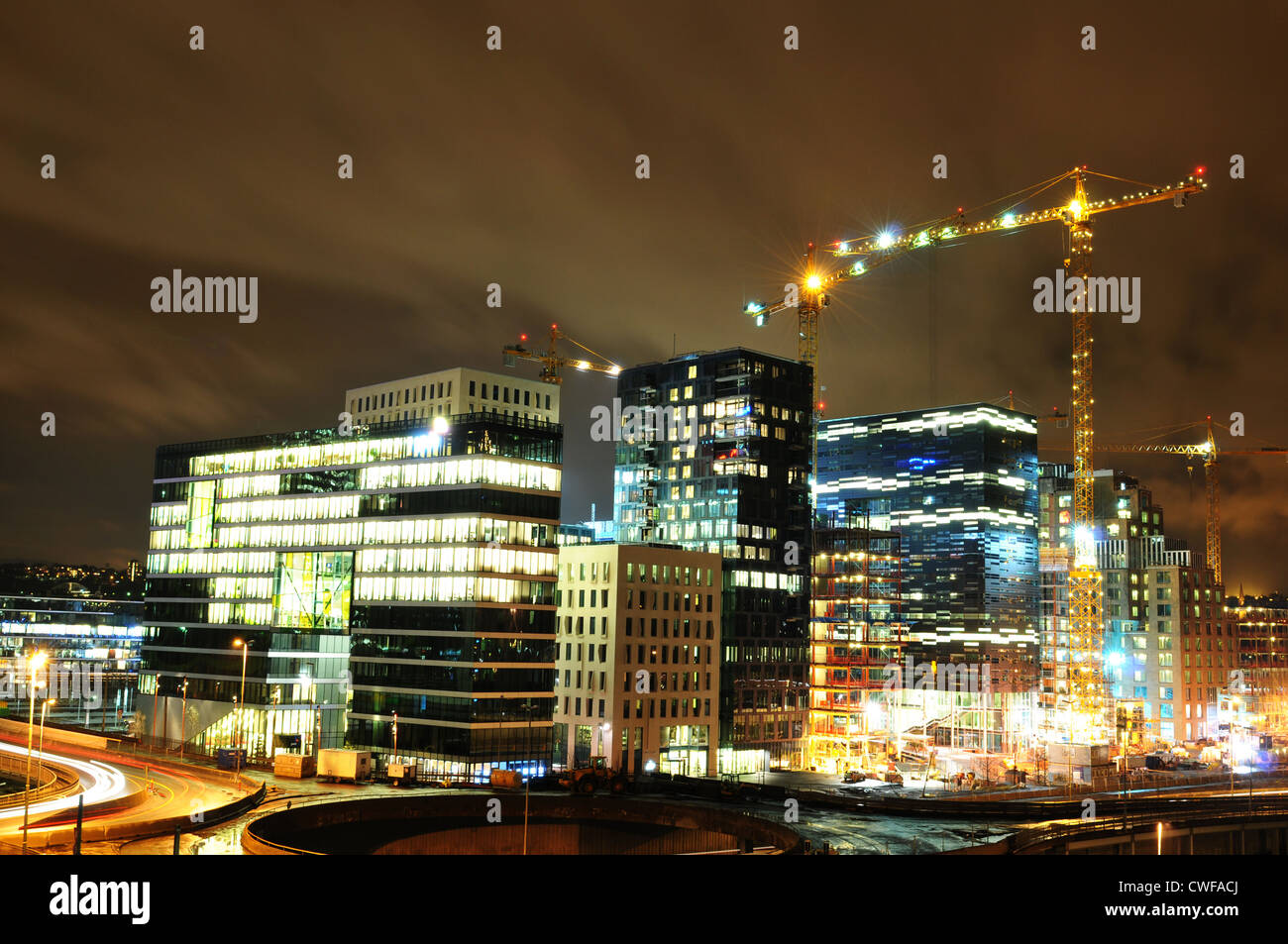 Night view of modern city under construction Stock Photo - Alamy