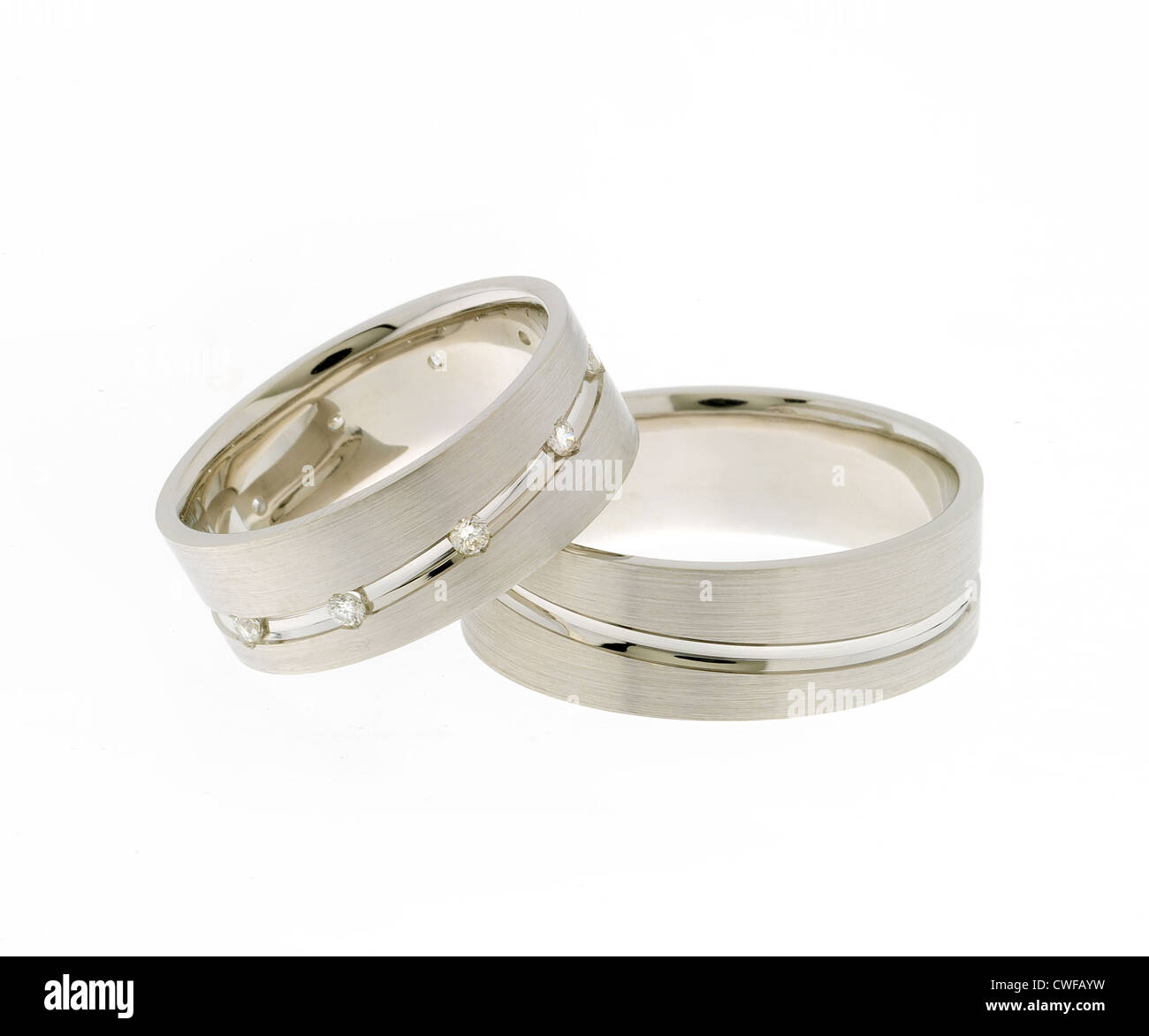 white gold rings on isolated white background Stock Photo - Alamy