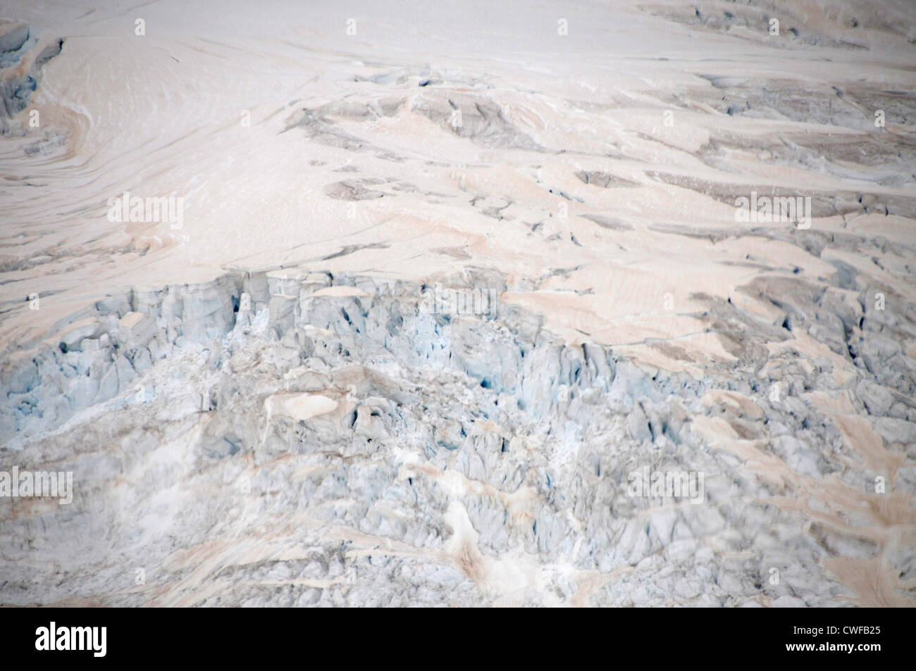 Deep crevasses form at the top of the12 km long Franz Josef Glacier set ...