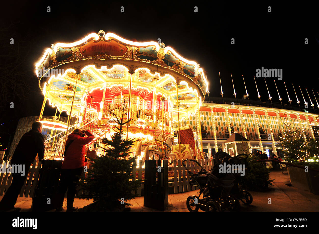 Copenhagen, Denmark - 18 Dec, 2011: Night view of carousel in Tivoli ...