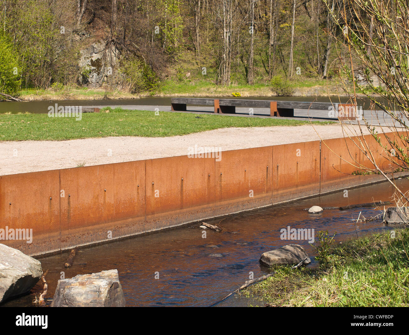 Park along the Alna river in the suburb Grorud, Oslo Norway using iron ...