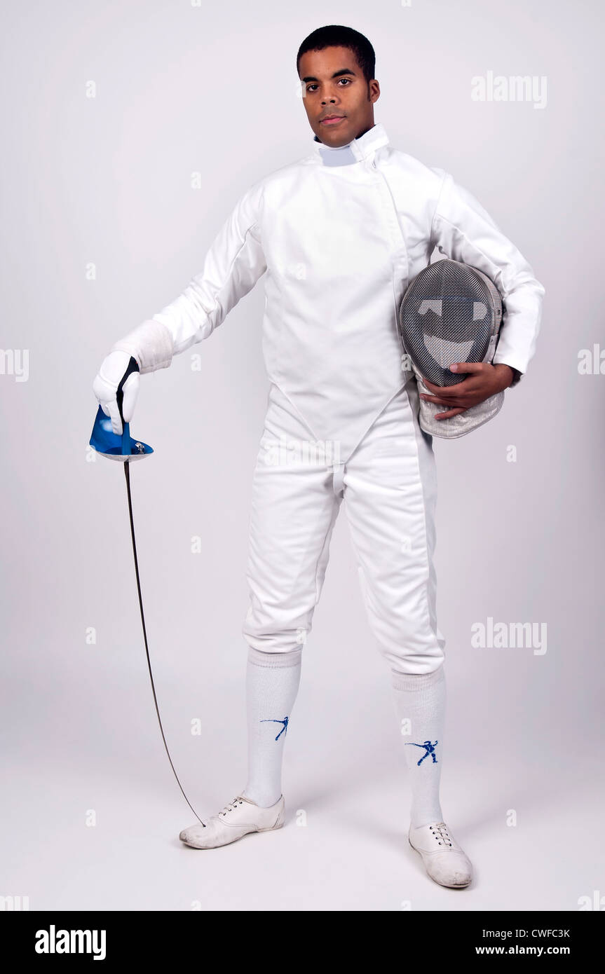 Male fencer isolated in a light background Stock Photo - Alamy