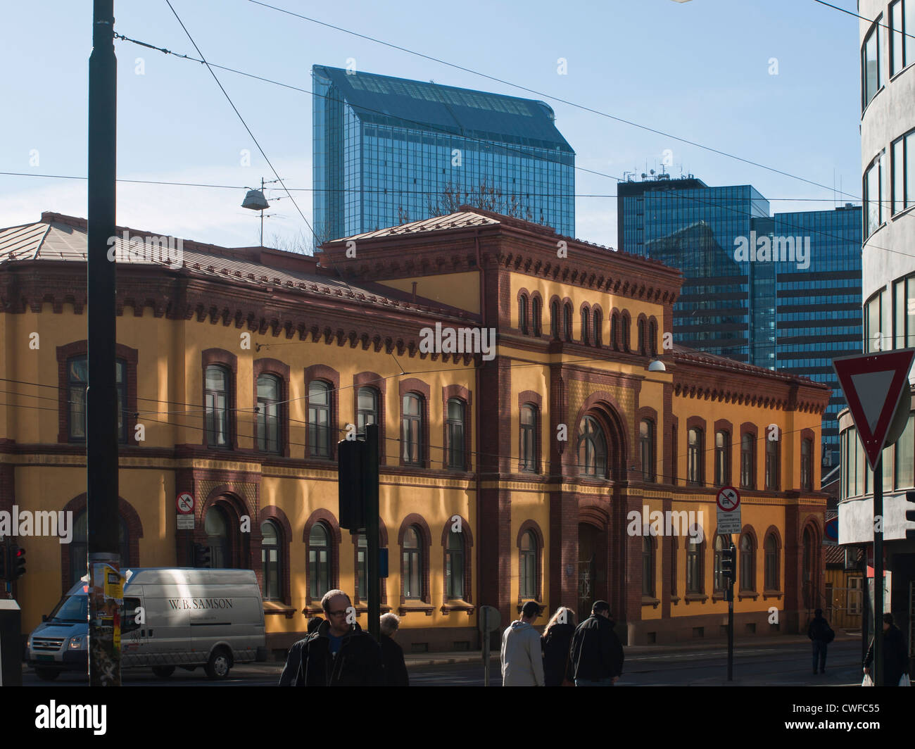 Old and new buildings in central Oslo, sunlight giving reflecting ...