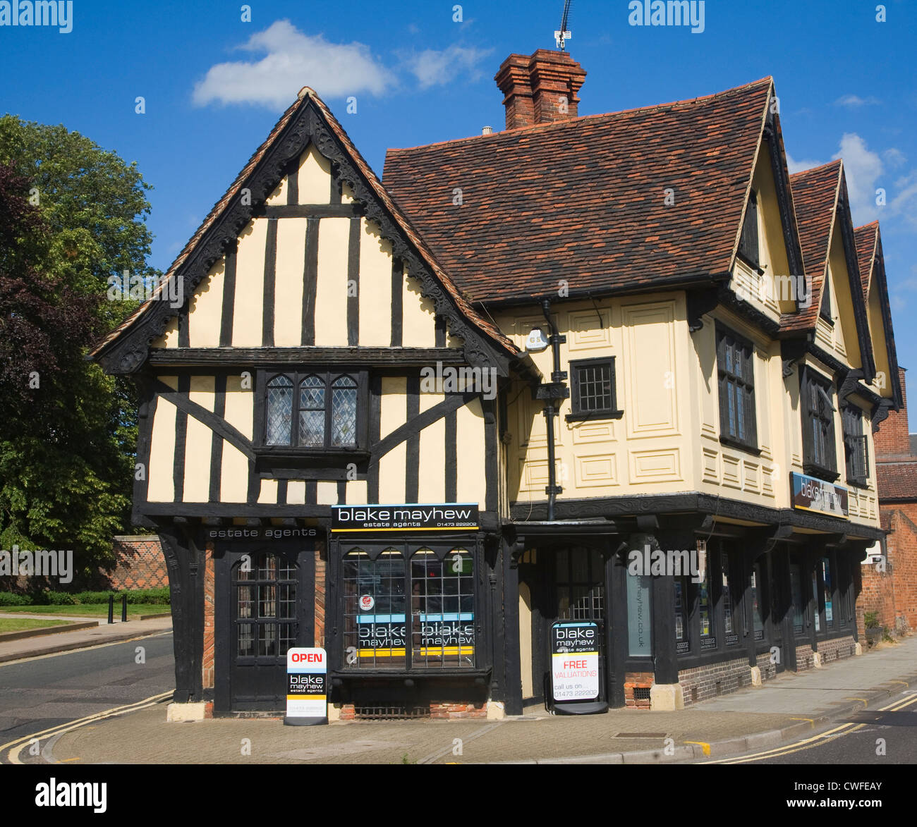 Historic timber framed tudor style building now an estate office hi-res ...