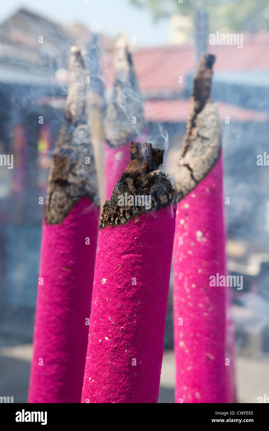 Pink incense sticks Stock Photo - Alamy