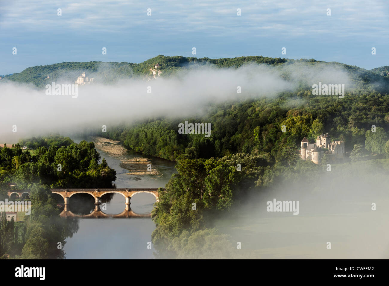 The Dordogne river and the Fayrac castle. The Castelnaud castle is ...