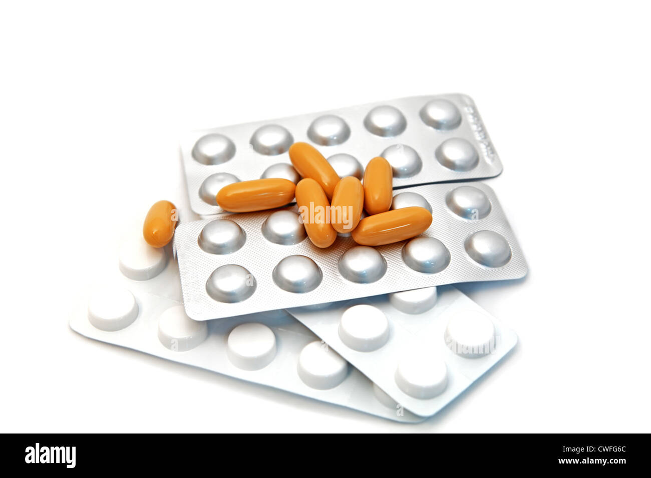 different pills on white background Stock Photo - Alamy