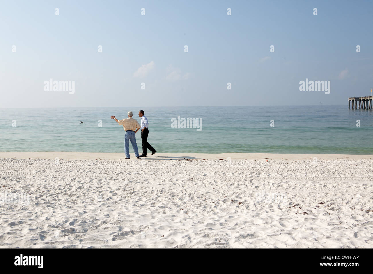President Barack Obama and Florida Gov. Charlie Crist talk while ...