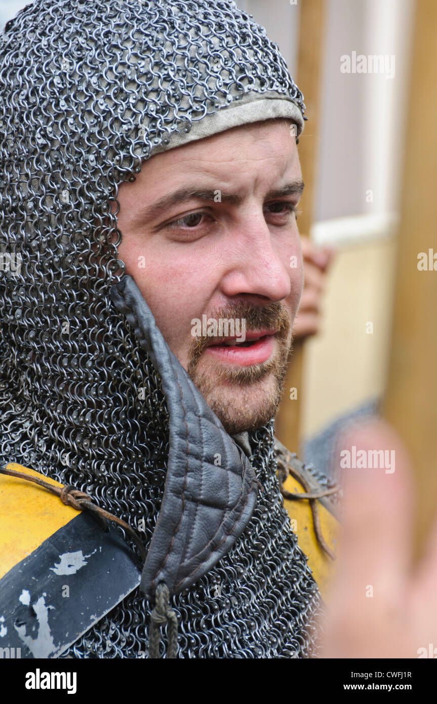 Man in arms medieval costume pikeman knight at an medieval market ...
