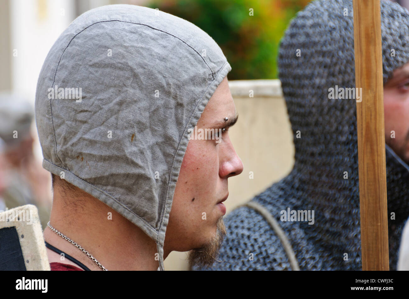Man in arms medieval costume pikeman knight at an medieval market ...