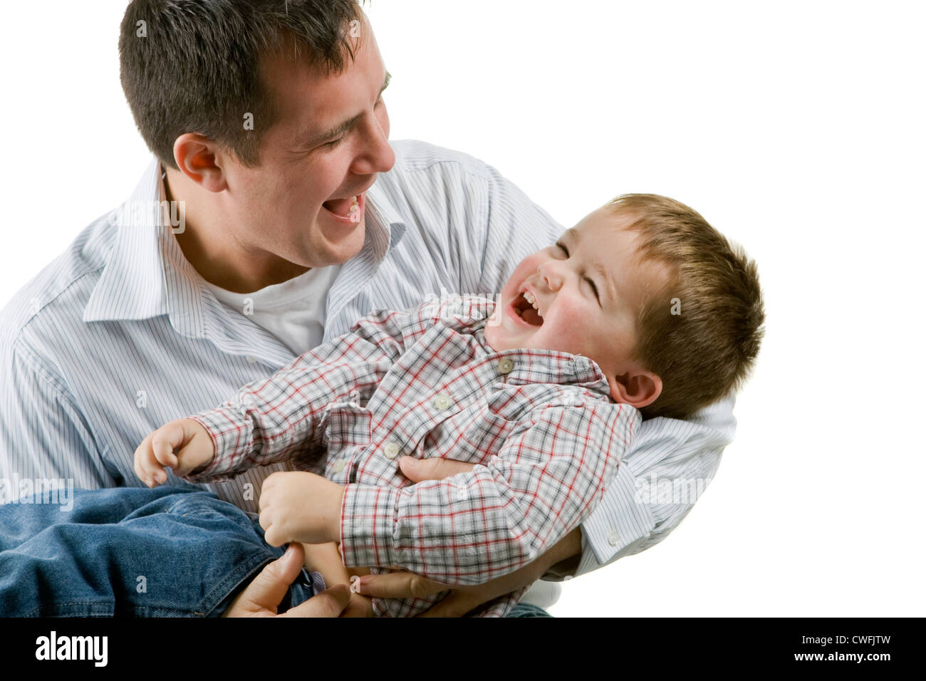 A wonderful image of a father and son laughing together Stock Photo - Alamy