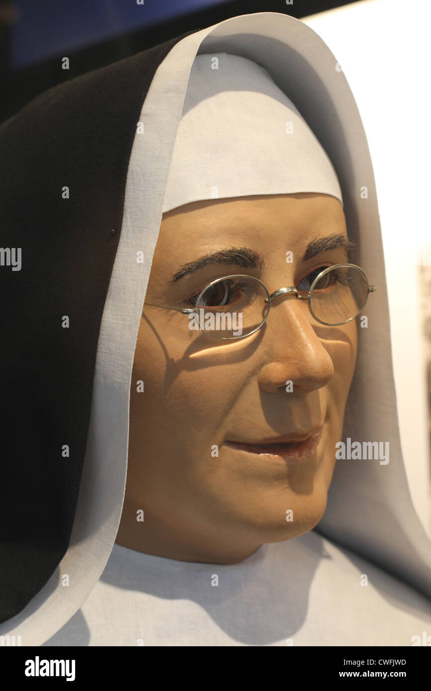 A close up of a statue of a nun Stock Photo - Alamy