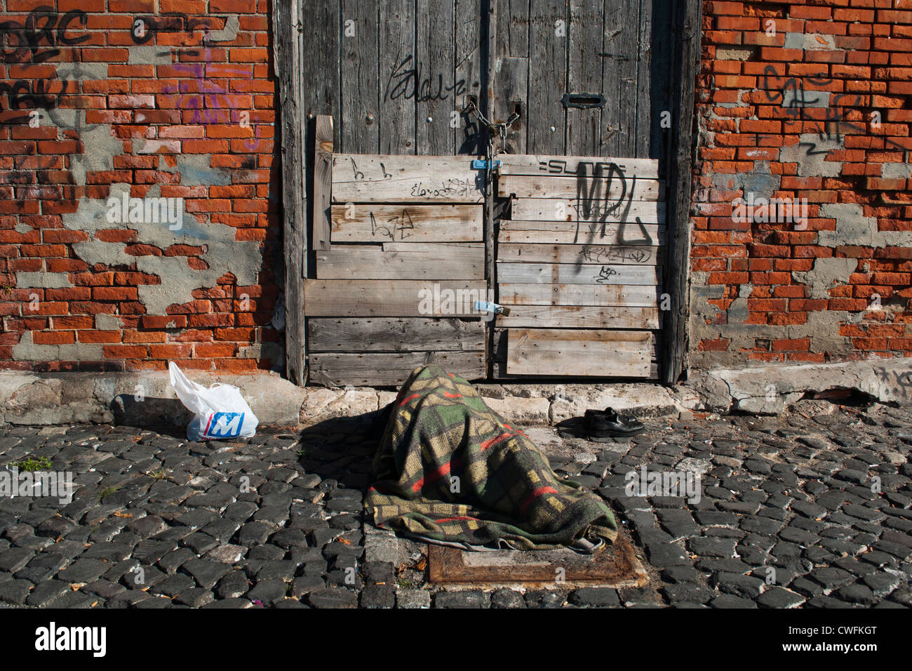 Homeless person sleeping. Lisbon, Portugal Stock Photo - Alamy