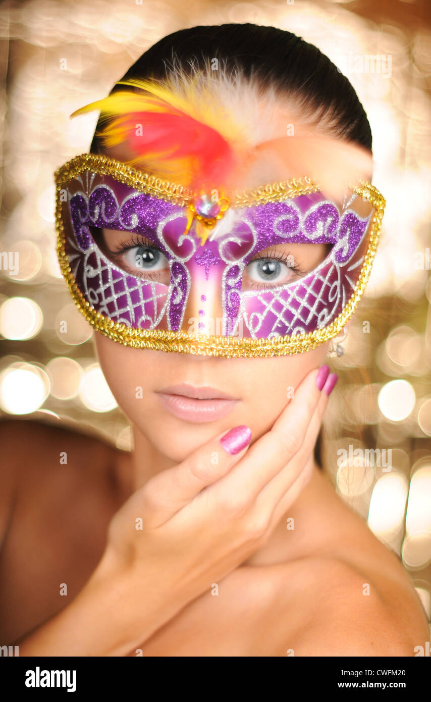 Beautiful girl in carnival mask Stock Photo - Alamy