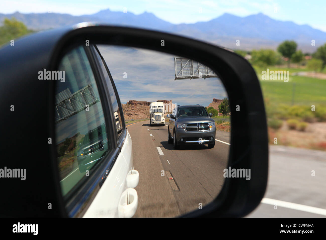 Reflection of Arizona landscape through car side mirror, Arizona, USA ...