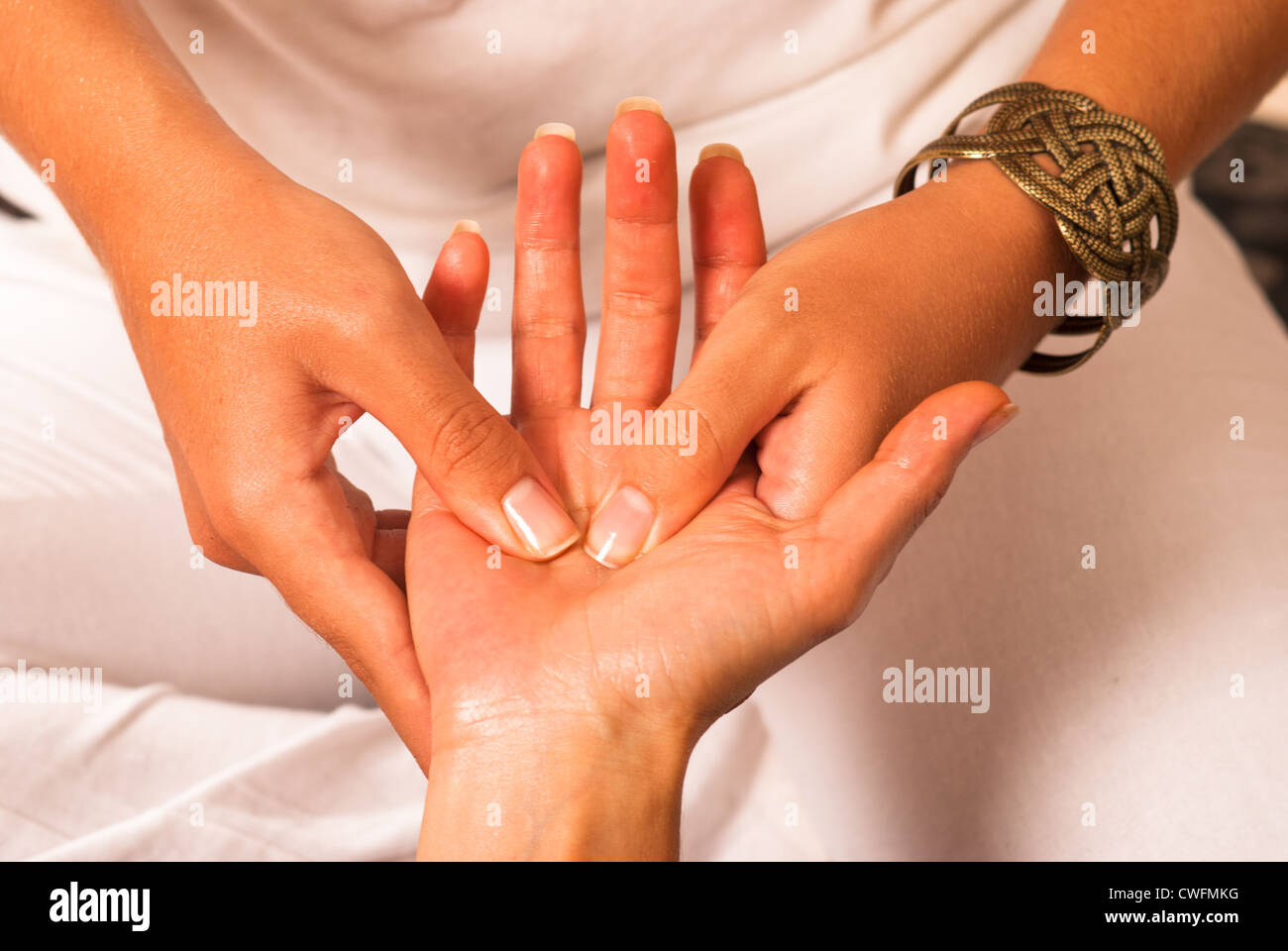 Closeup of a therapist massaging a hand Stock Photo - Alamy