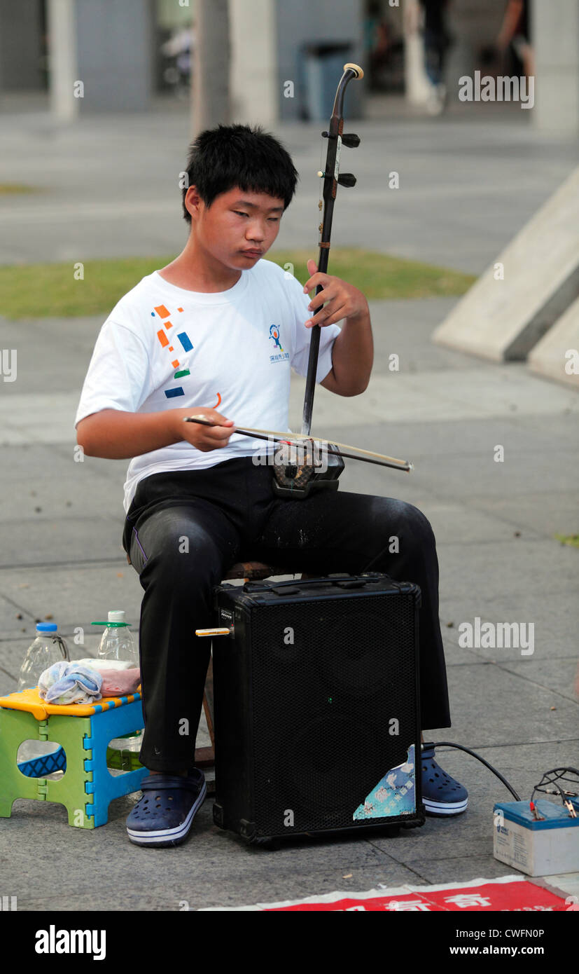Chinese busker hi-res stock photography and images - Alamy