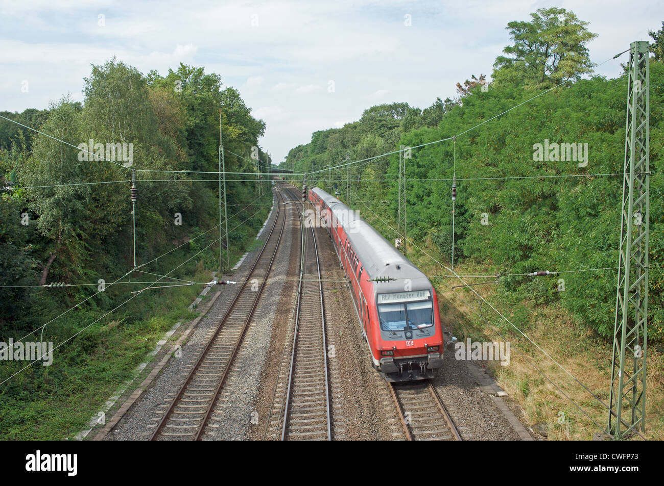 RE7 (Regional Express) passenger train from Cologne to Munster passing ...