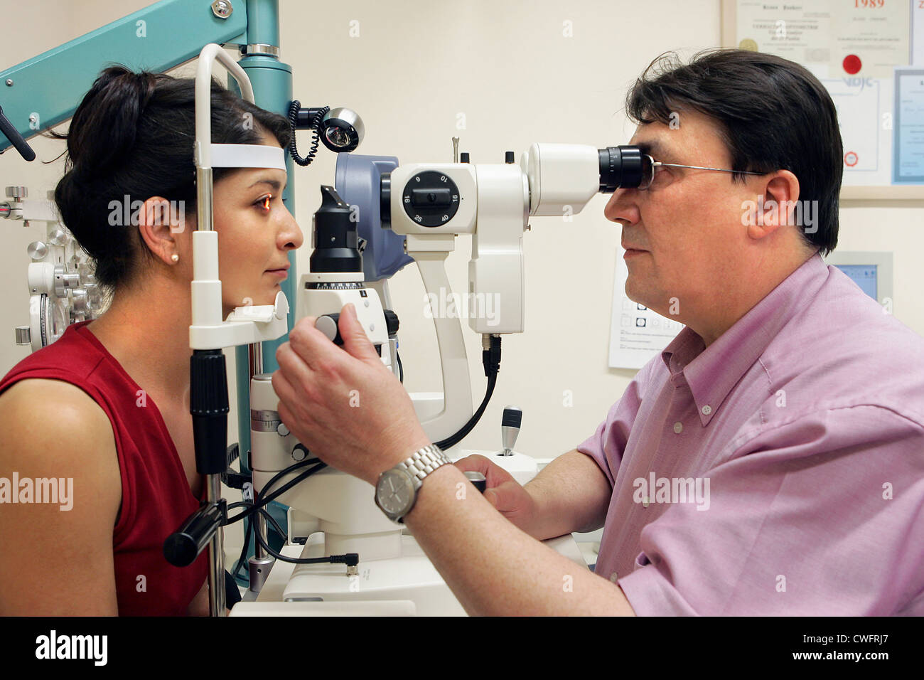 Examination with slit lamp Stock Photo - Alamy