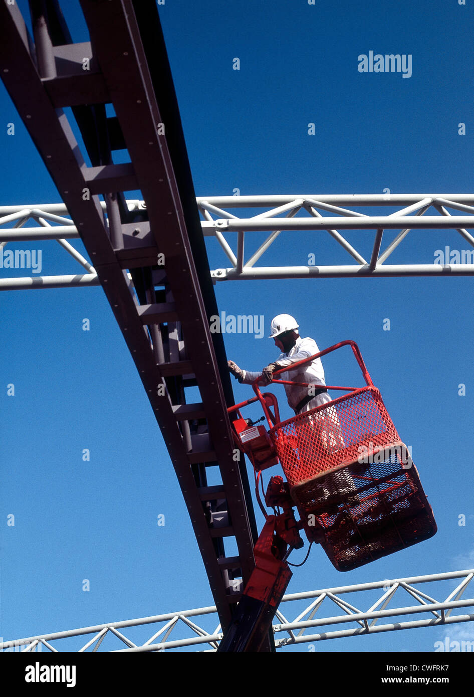 Steelworker working in high-level platform Stock Photo - Alamy