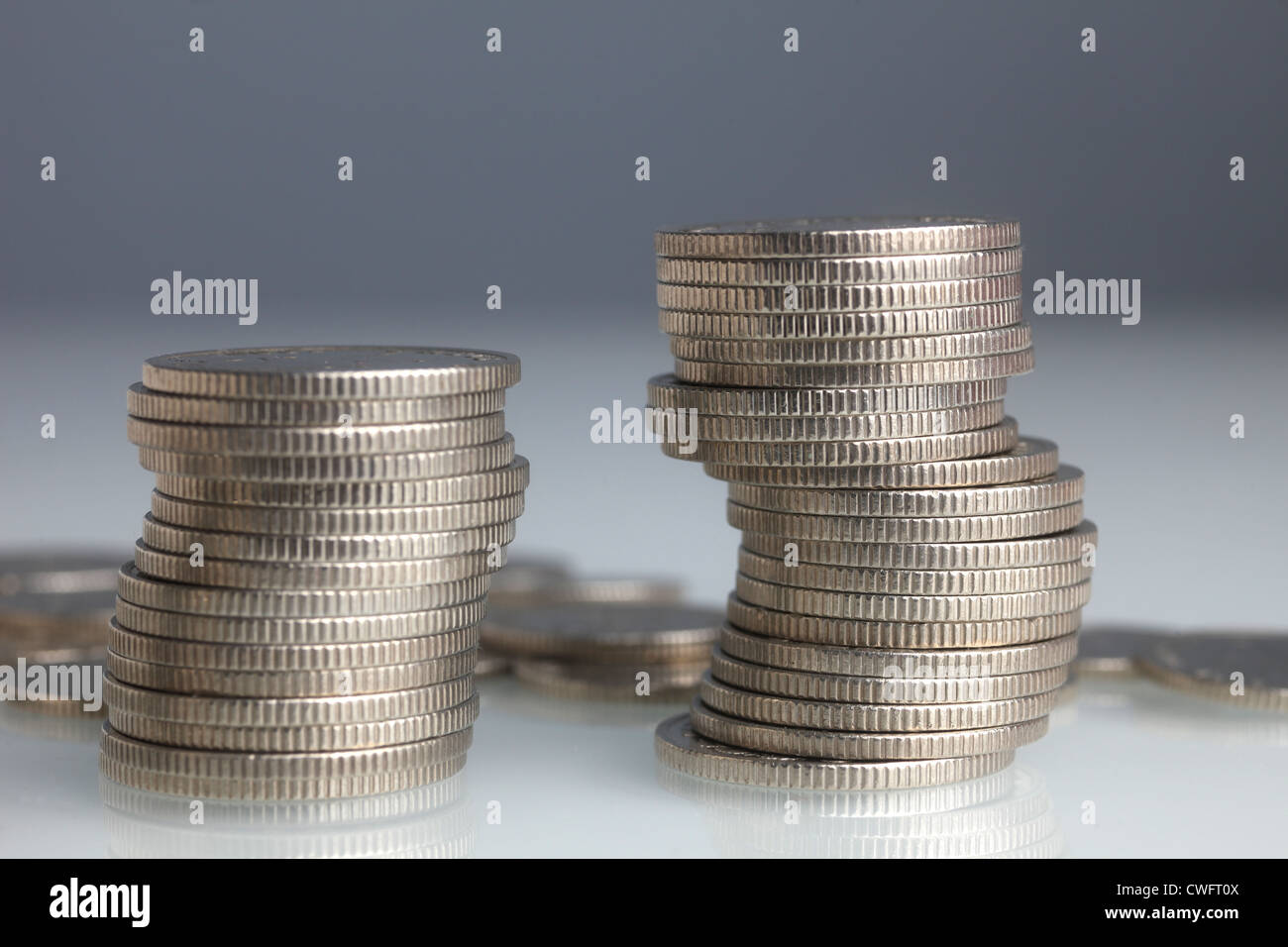 Stacks of money coins Stock Photo - Alamy