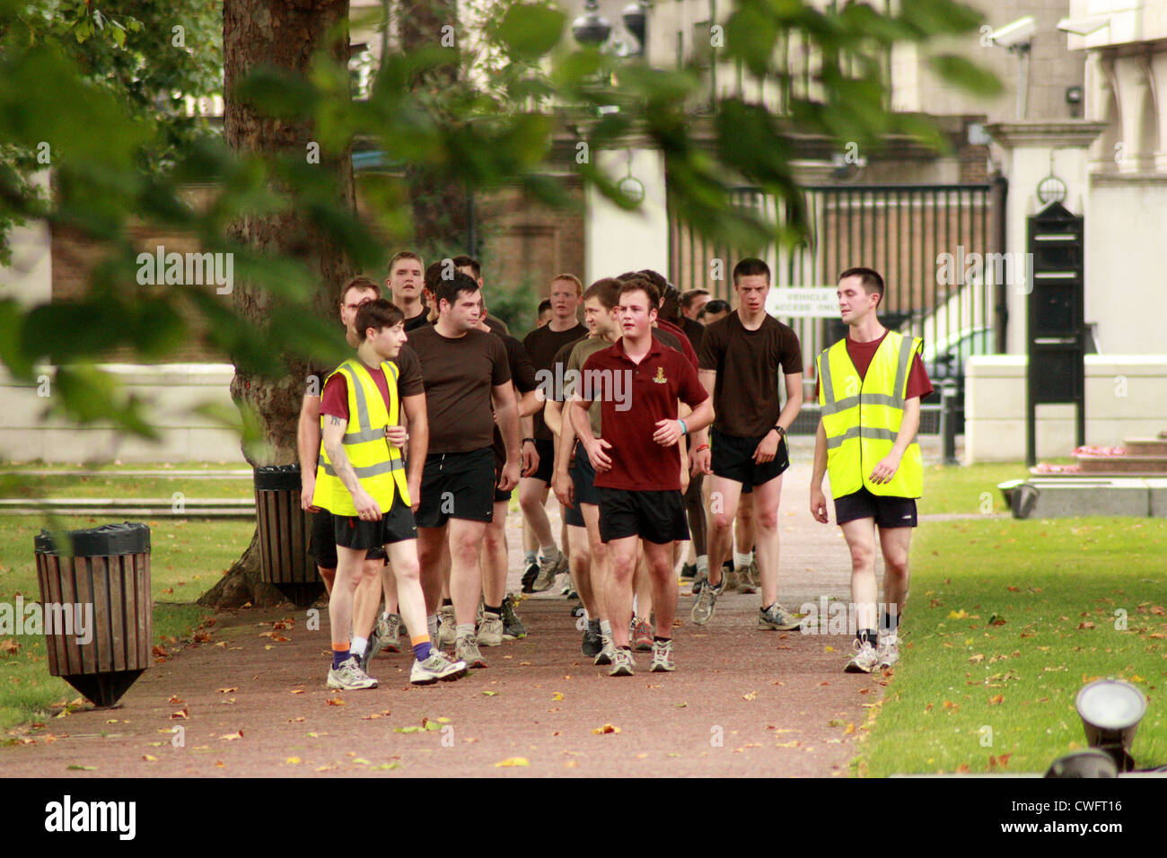 group of men training in a park Stock Photo - Alamy
