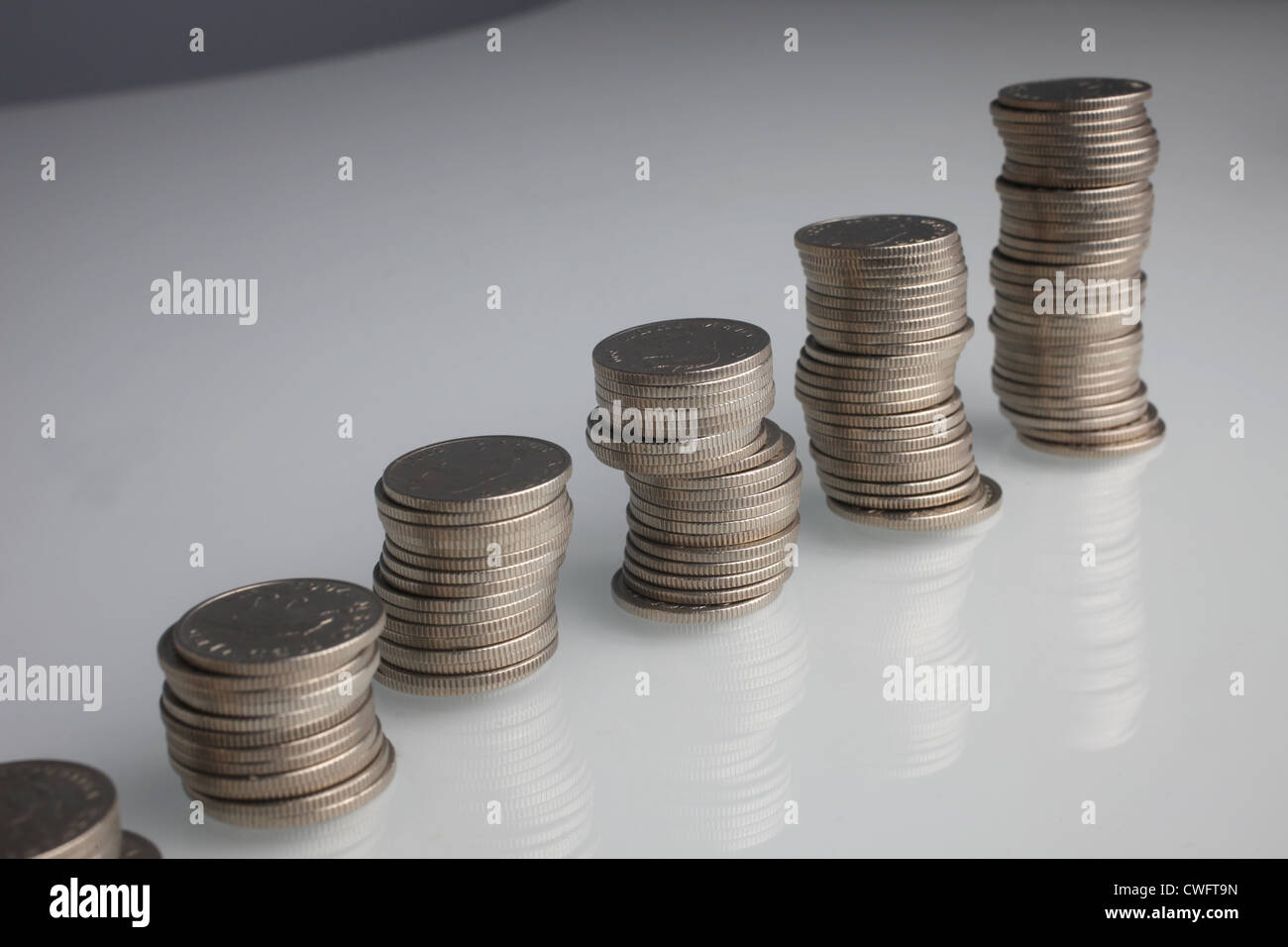 Stacks of money coins Stock Photo - Alamy
