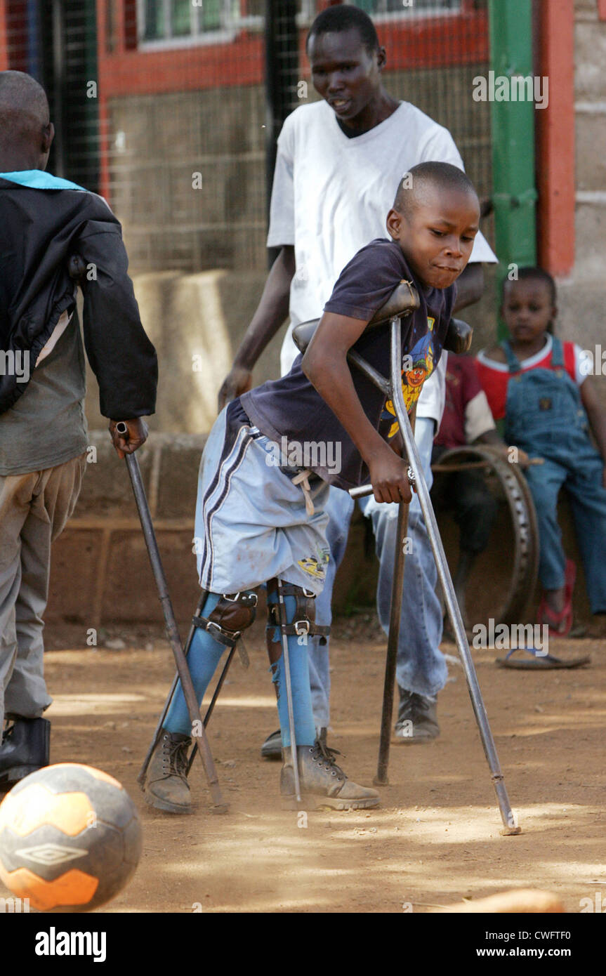 Kenya, handicapped.All boys playing football in the mission Nyabondo ...