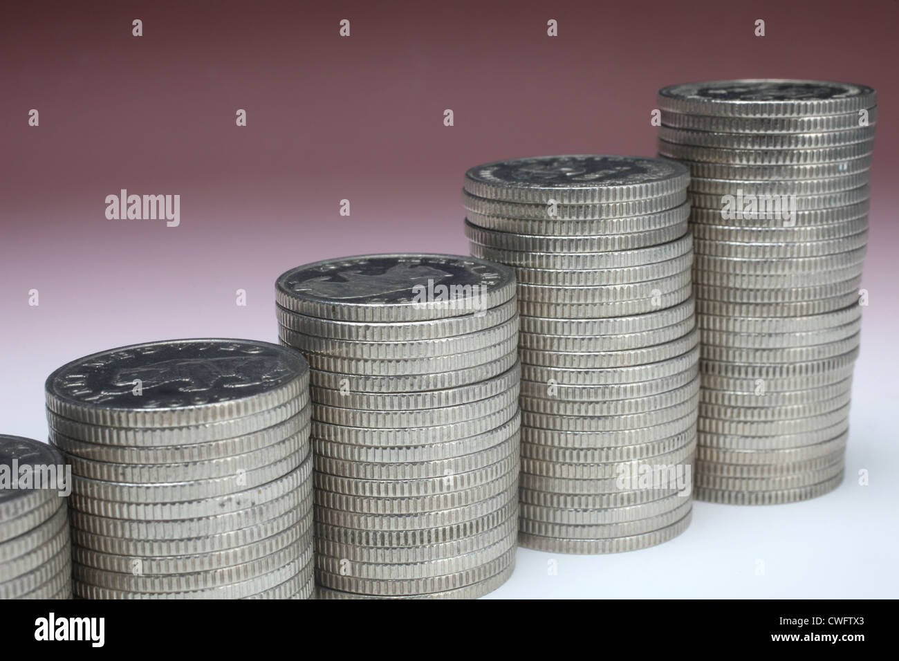 Stacks of money coins Stock Photo - Alamy