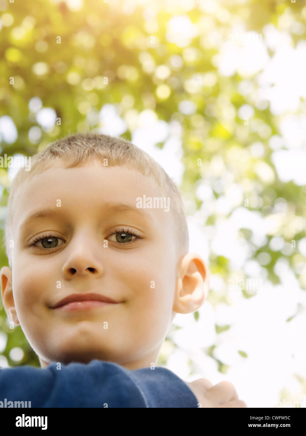 Little boy close up looking at camera Stock Photo - Alamy