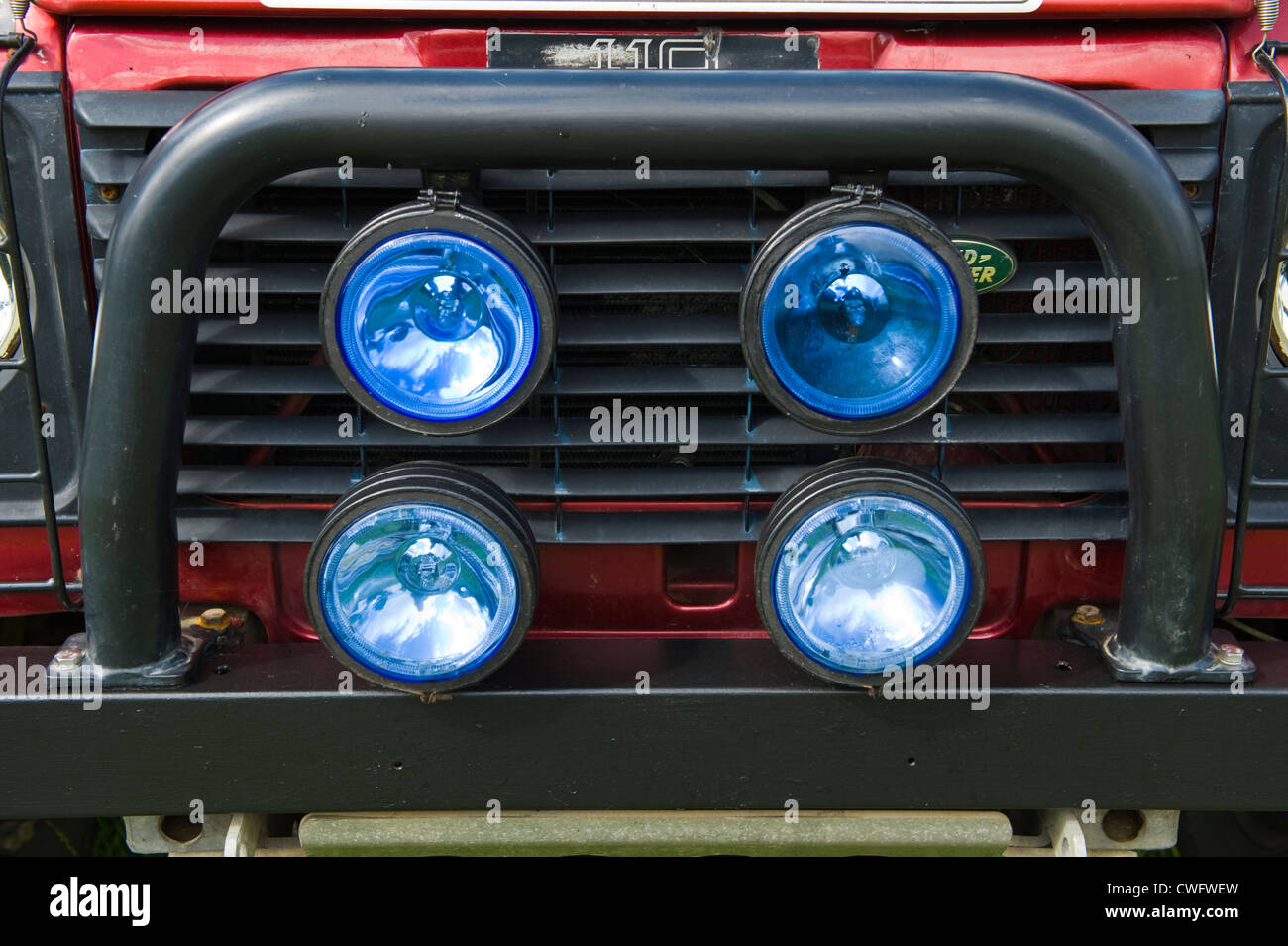 Spot lamps and bull bars on 4x4 Land Rover Defender 90 at annual ...
