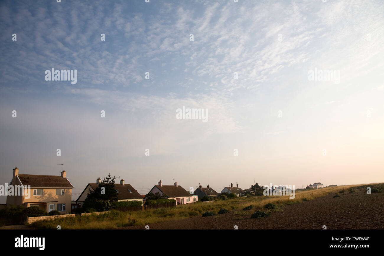 Houses on beach Shingle Street Suffolk England Stock Photo - Alamy