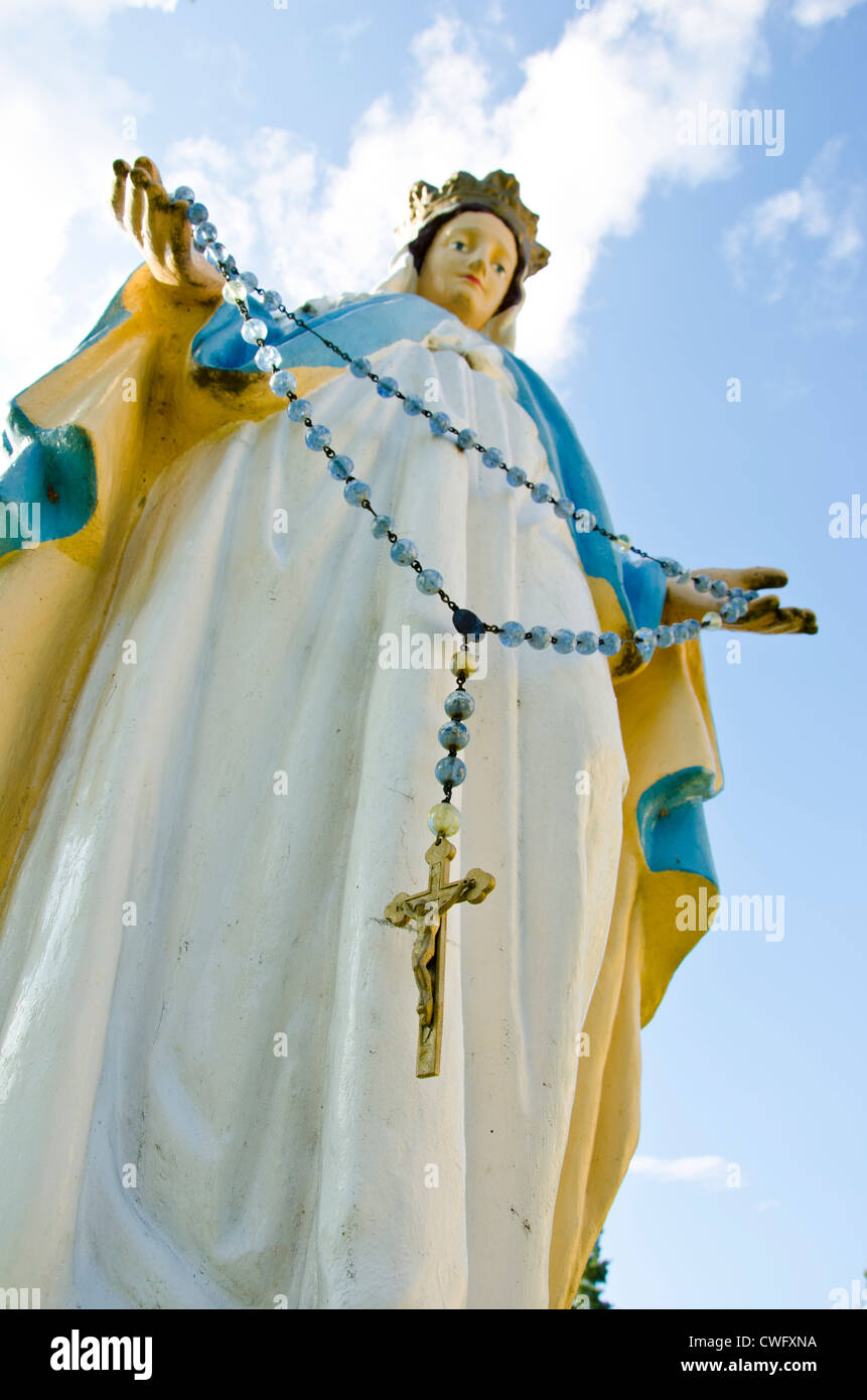 vintage religious thematic sculpture on sky background Stock Photo - Alamy