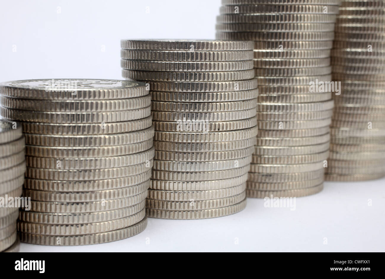 Stacks of money coins Stock Photo - Alamy