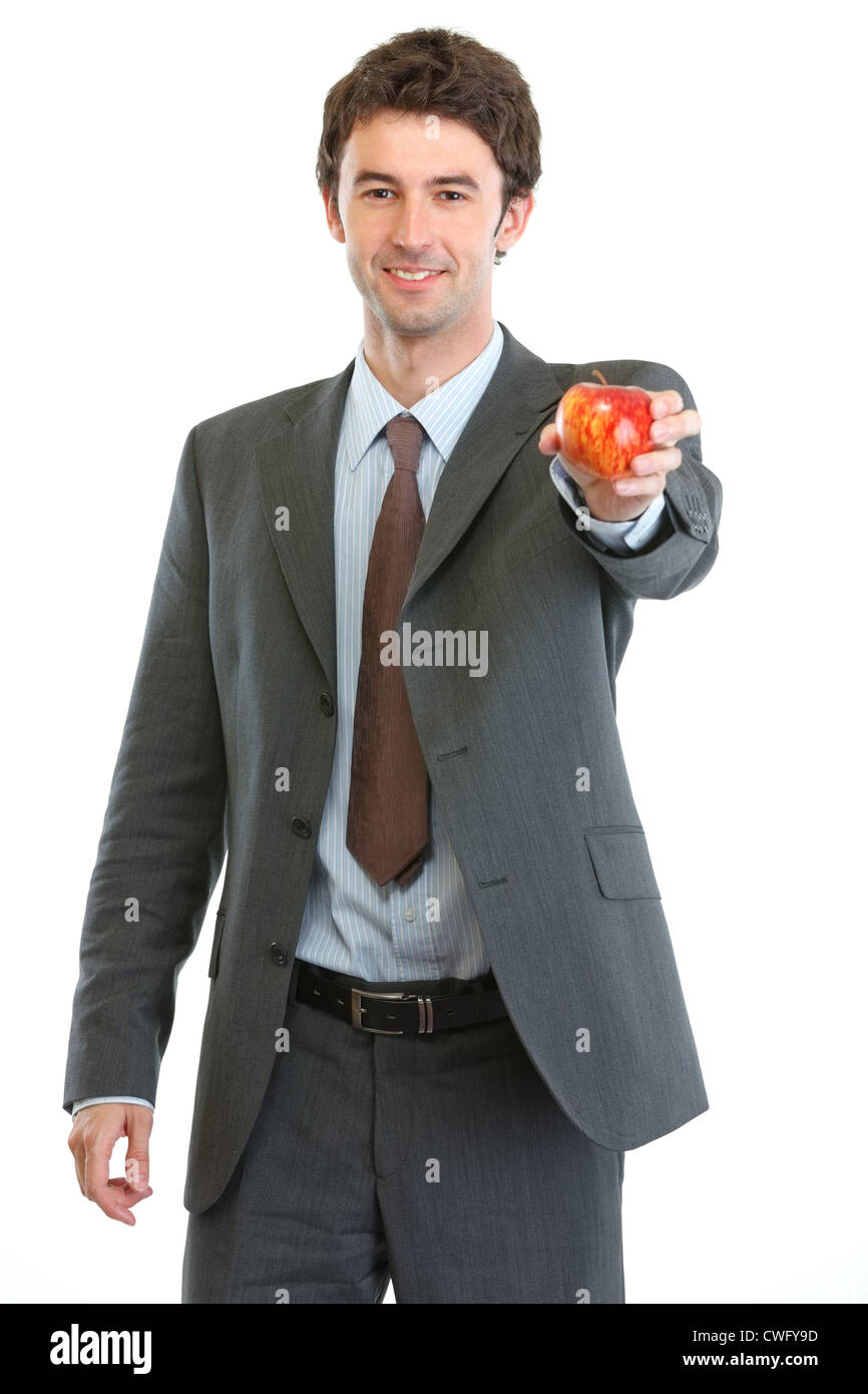 Modern businessman giving apple hi-res stock photography and images - Alamy