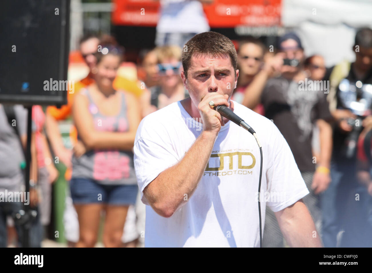 man singing talking microphone outdoor Stock Photo - Alamy