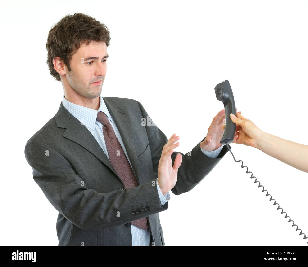 Concerned businessman refusing answer phone call Stock Photo - Alamy