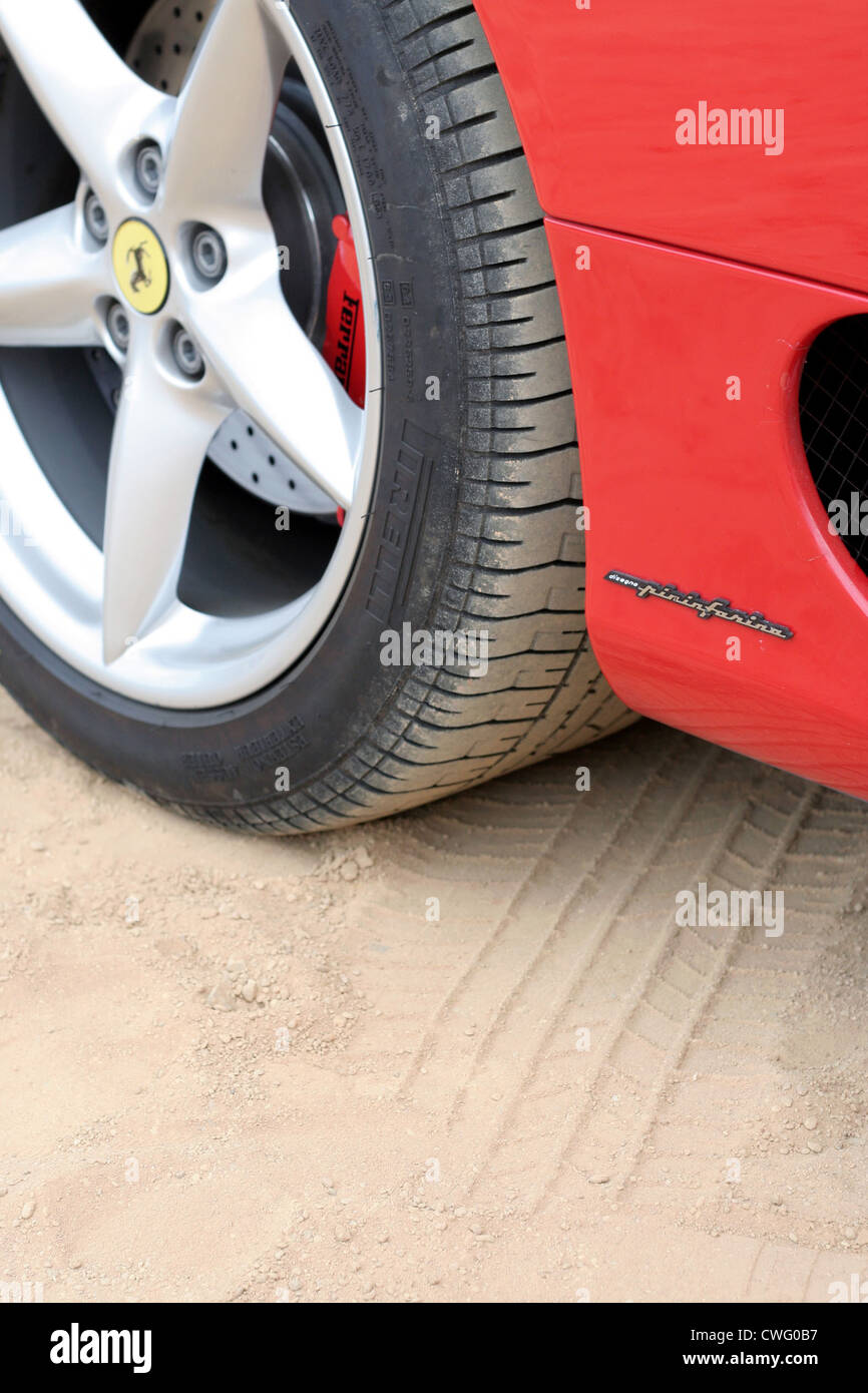 Wheel and fender of a Ferrari Stock Photo - Alamy