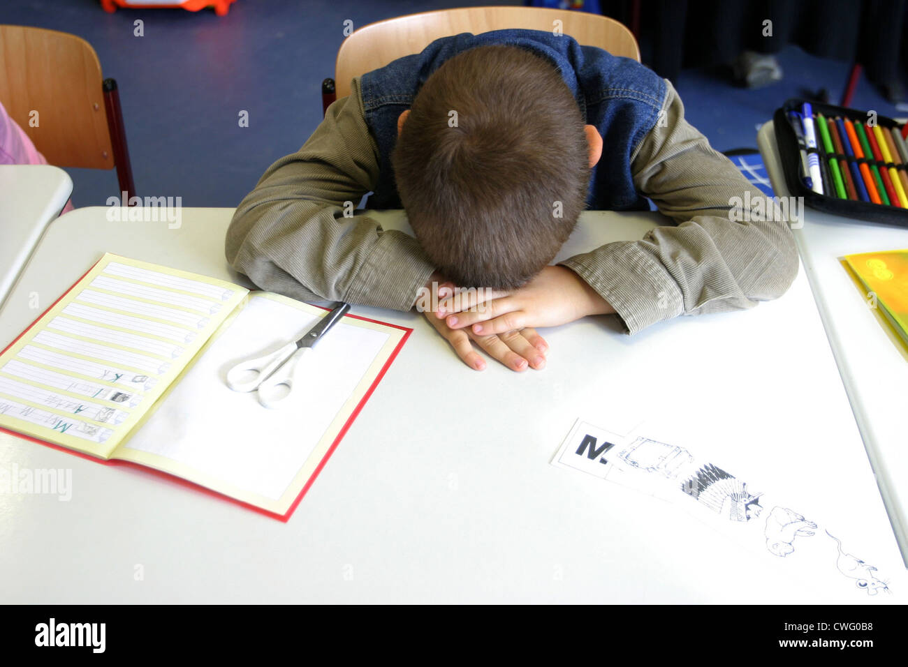 A student sleeping in class Stock Photo - Alamy