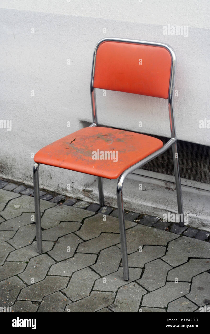 Rotting chair on the Sidewalk Stock Photo - Alamy