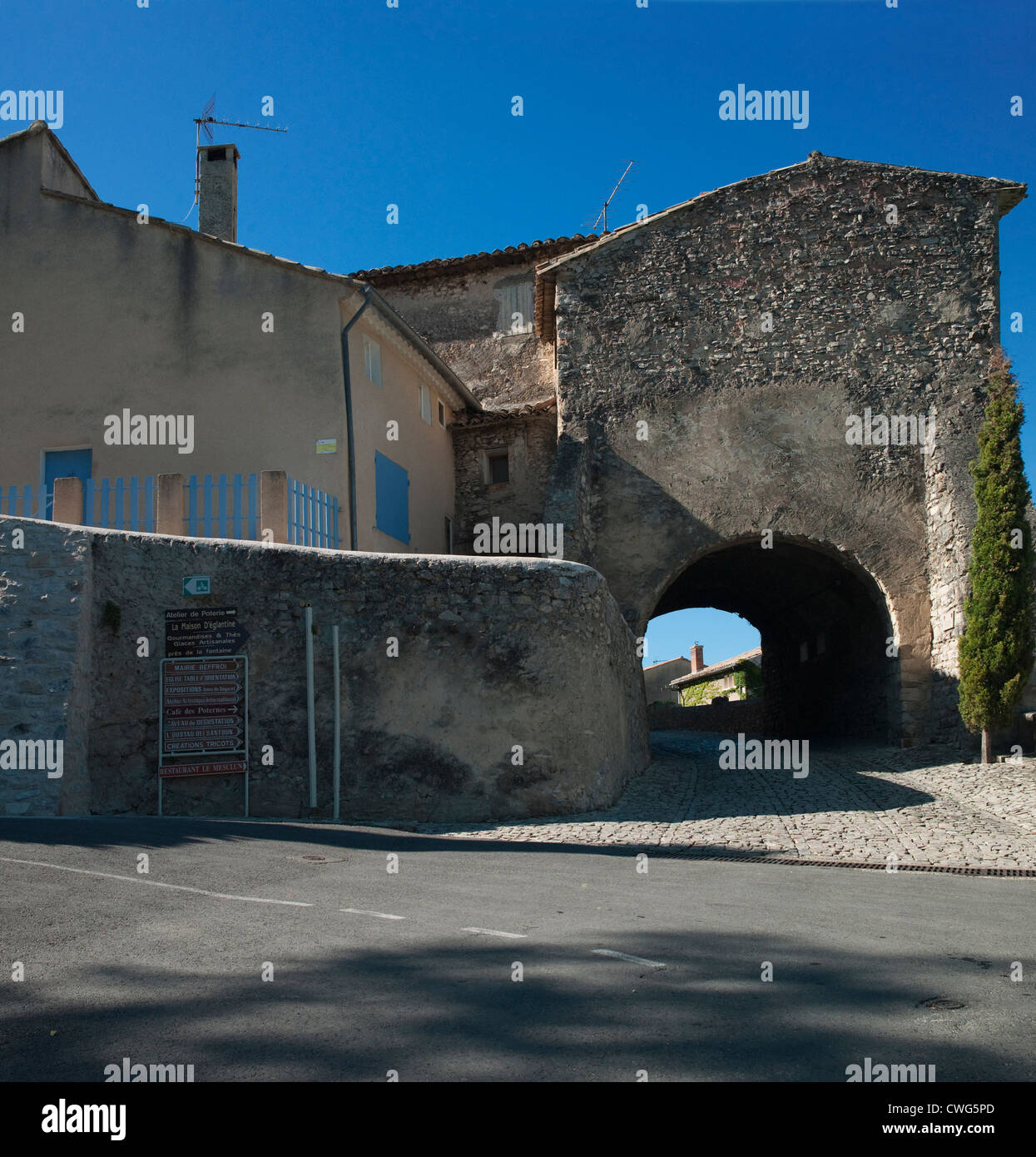 Arched entrance to the old wine making village of Seguret in the ...