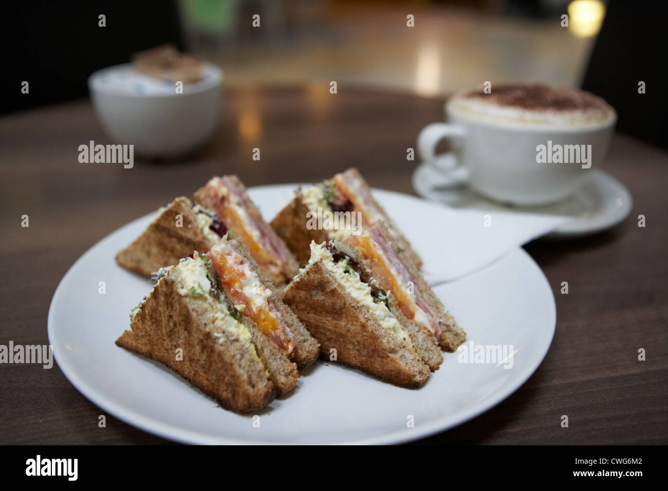 triple modern club sandwich in a cafe in edinburgh, scotland, uk ...