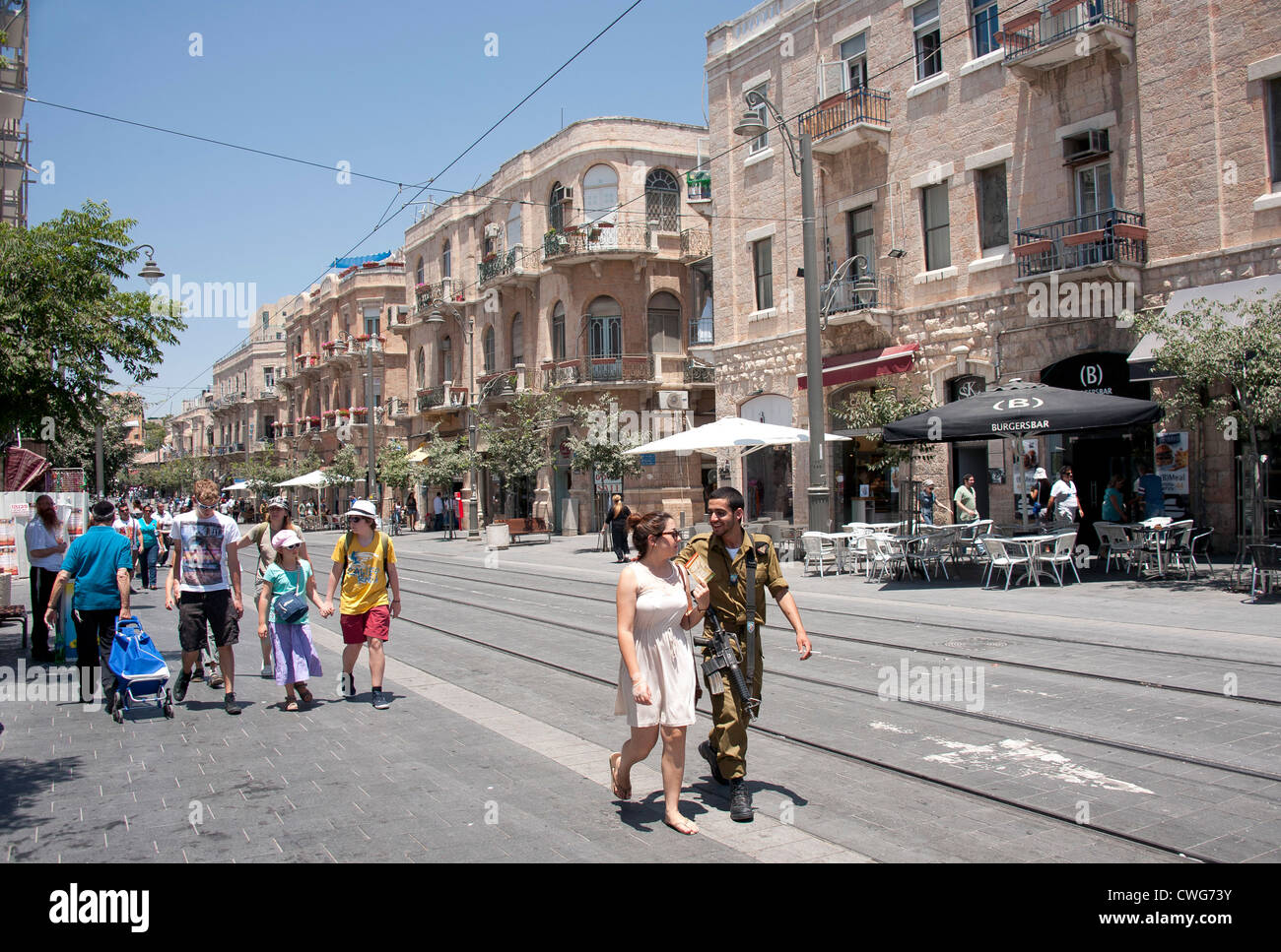 An Israeli soldier and a female walk down Jaffa Road, Jerusalem, Israel ...