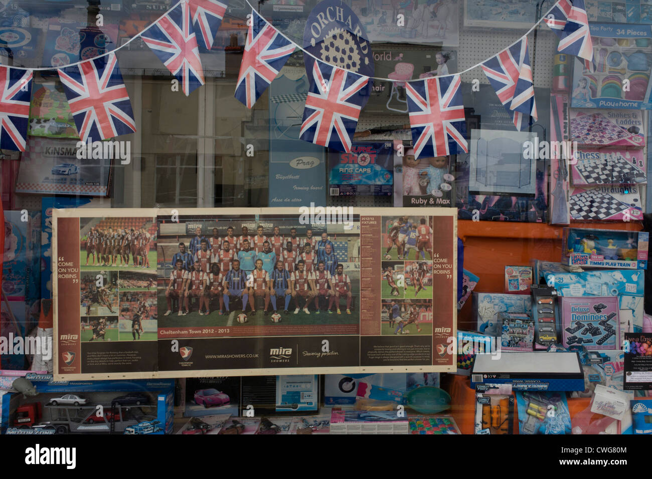 Football team poster from a local newspaper on display in the window of ...