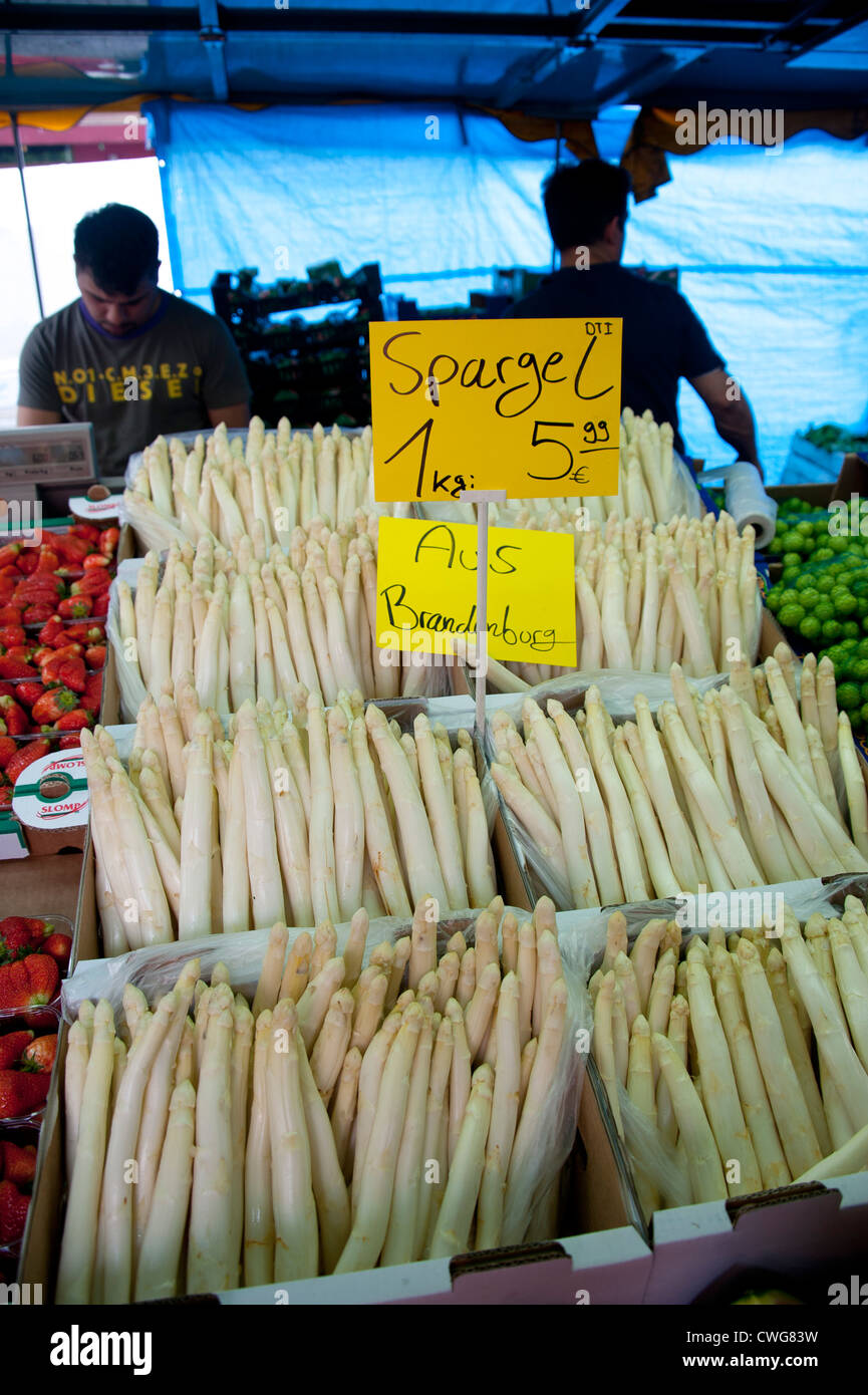 A street market stall selling Spargel (white asparagus) in Kreuzberg ...