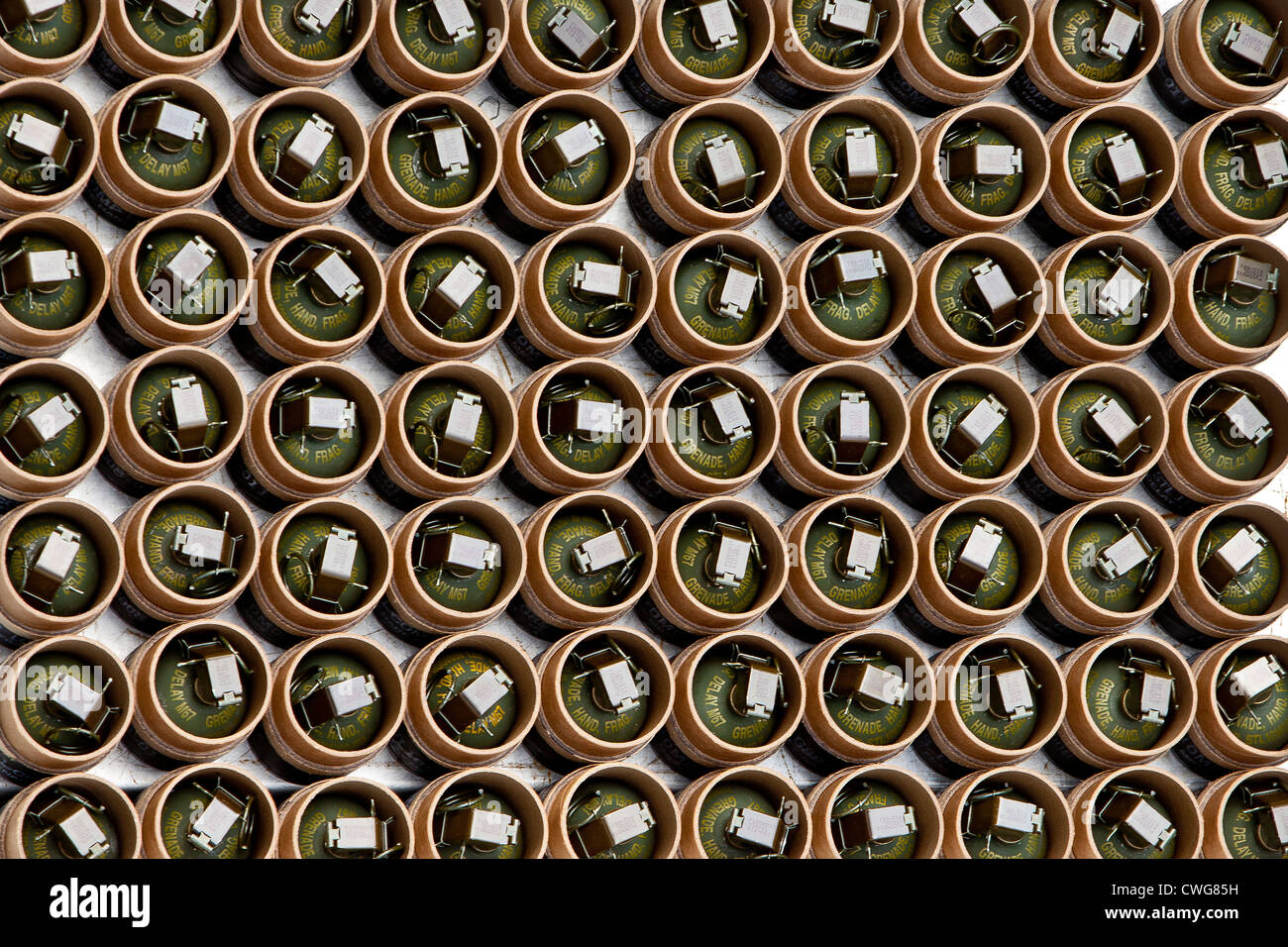 Live grenades are placed on a table before a live grenade range part of ...