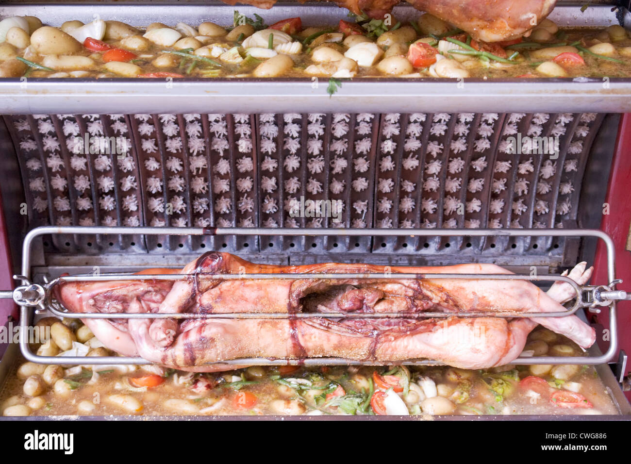 Porc grilling in Paris Stock Photo - Alamy