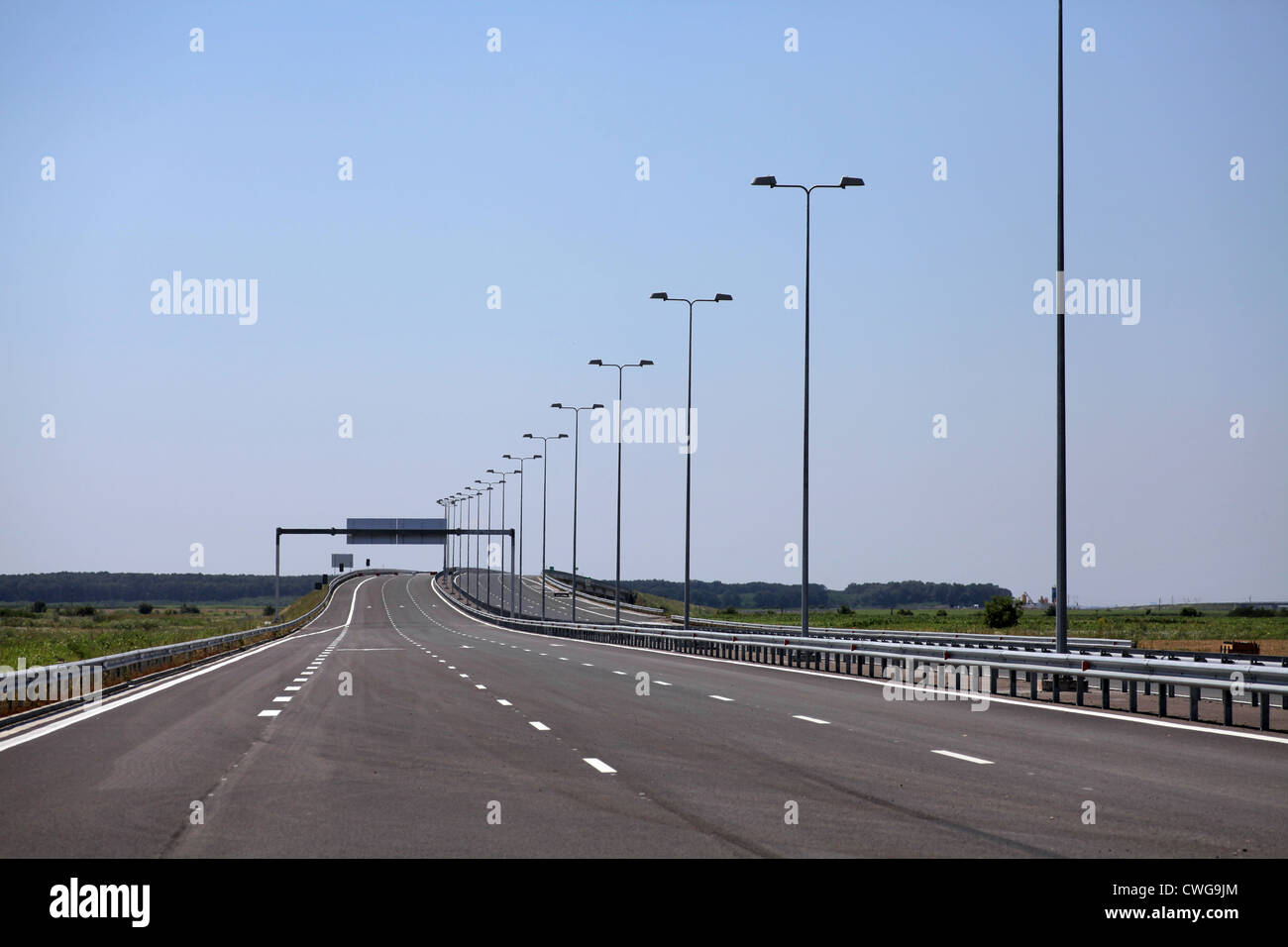 Color shot of a newly built highway with no traffic Stock Photo - Alamy